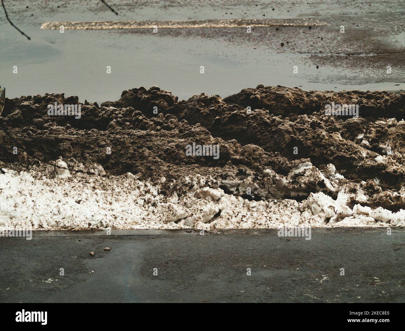 muddy over-salted snow and slush on street Stock Photo - Alamy