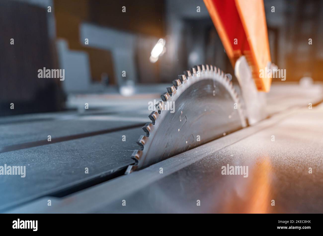 Closeup of wood cutting table with electric circular saw. Professional ...