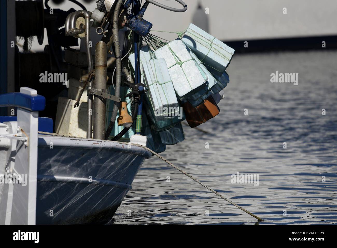 Traditional Greek fishing boat on the waters of Vourkari in Kea island ...