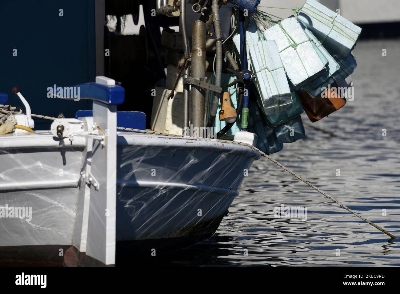 Traditional Greek fishing boat on the waters of Vourkari in Kea island ...