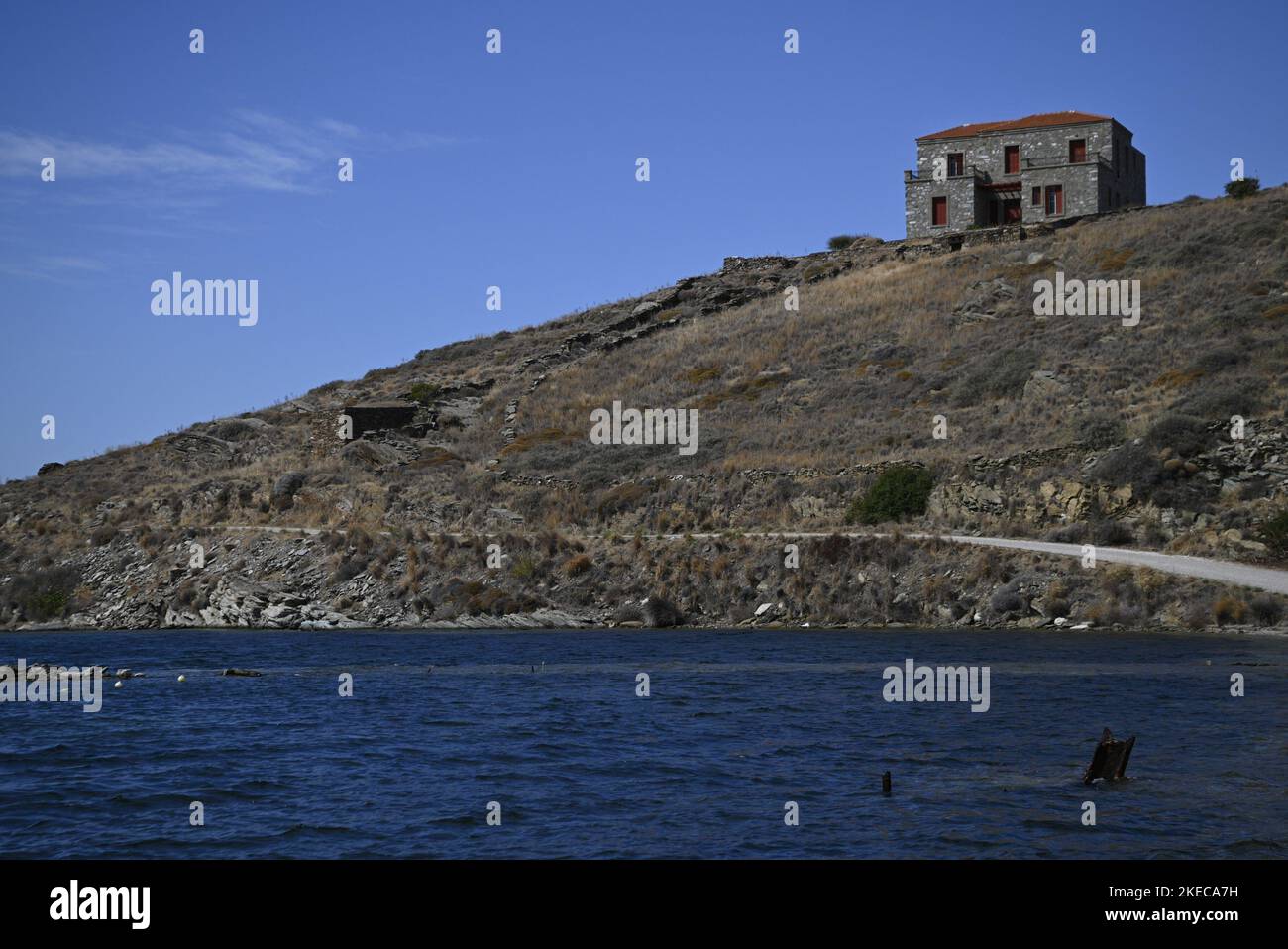 Landscape with scenic view of an old abandoned stone built coal mine ...
