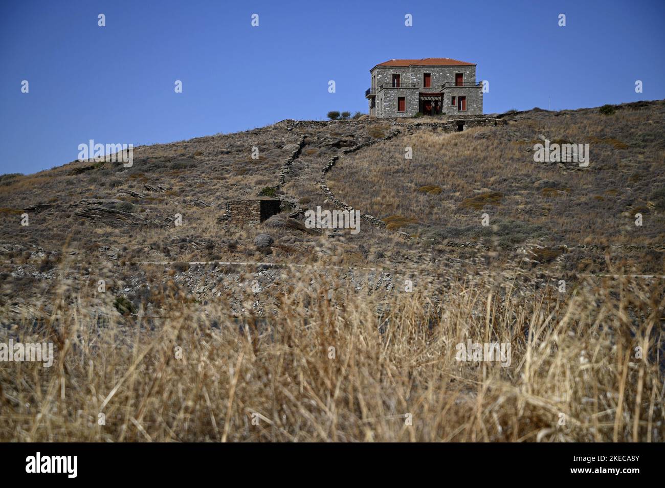 Landscape with scenic view of an old abandoned stone built coal mine ...