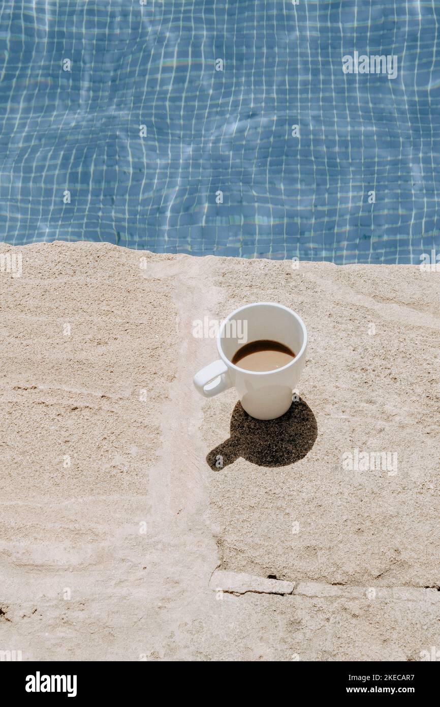 Cup of coffee, pool Stock Photo - Alamy