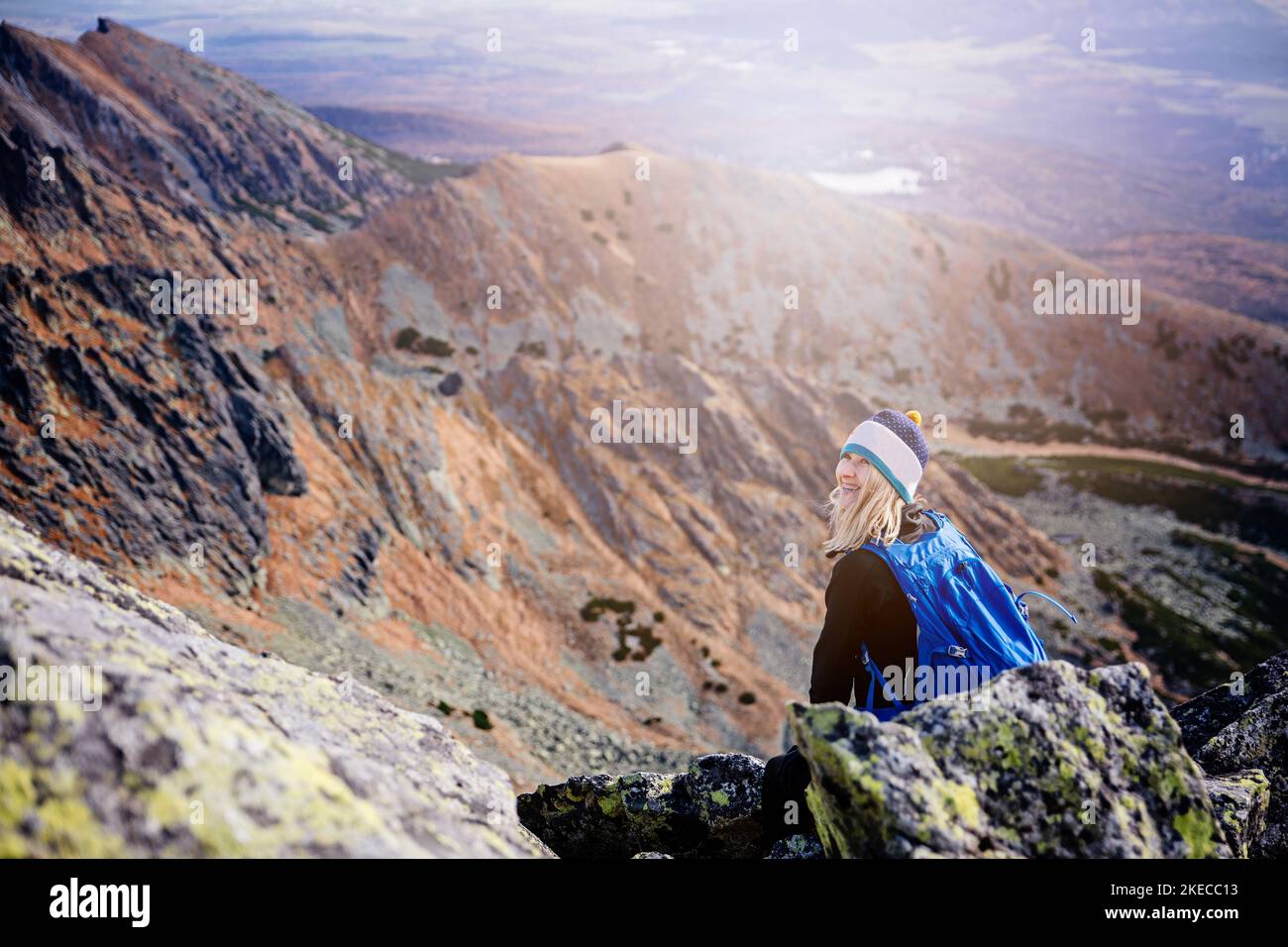 Beautiful blonde woman enjoys the moment while hiking in the Slovak ...
