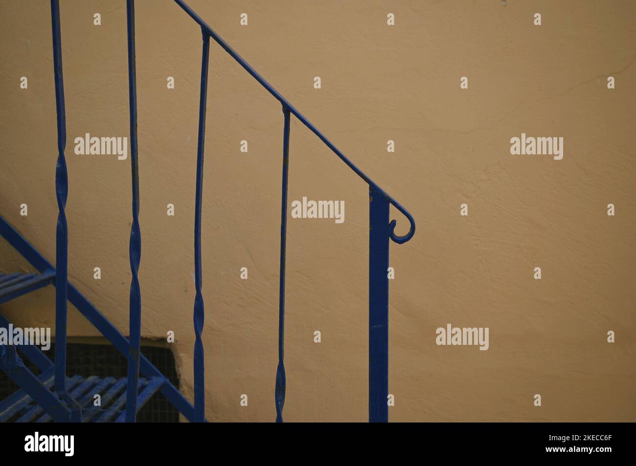 Old traditional house handcrafted wrought iron stairway railing against ...