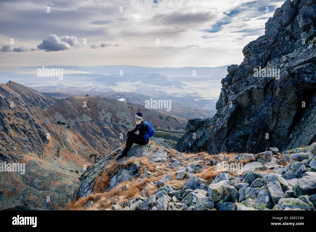 Beautiful blonde woman enjoys the moment while hiking in the Slovak ...