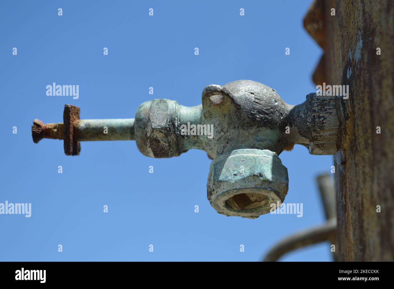 An Old weathered valve on water boiler Stock Photo - Alamy
