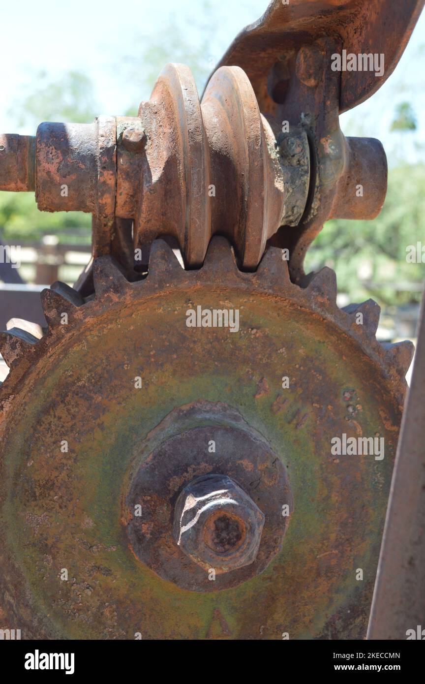 A vertical shot of a Rusted worm gear Stock Photo - Alamy