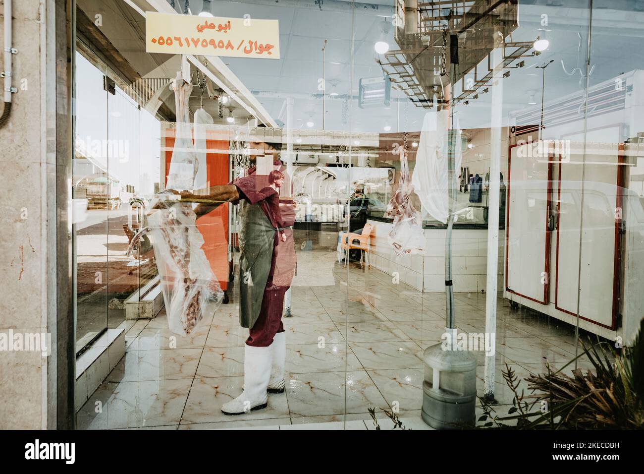 Saudi Arabia, Najran province, Najran, butcher shop, reflection, window ...