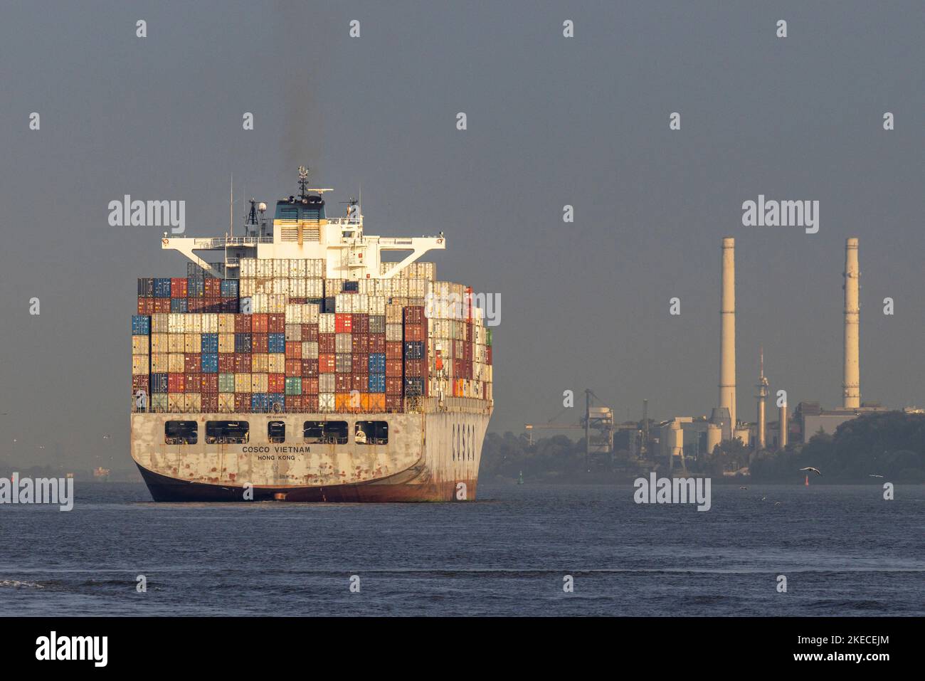 The container ship Cosco Vietnam leaving the port of Hamburg Stock ...
