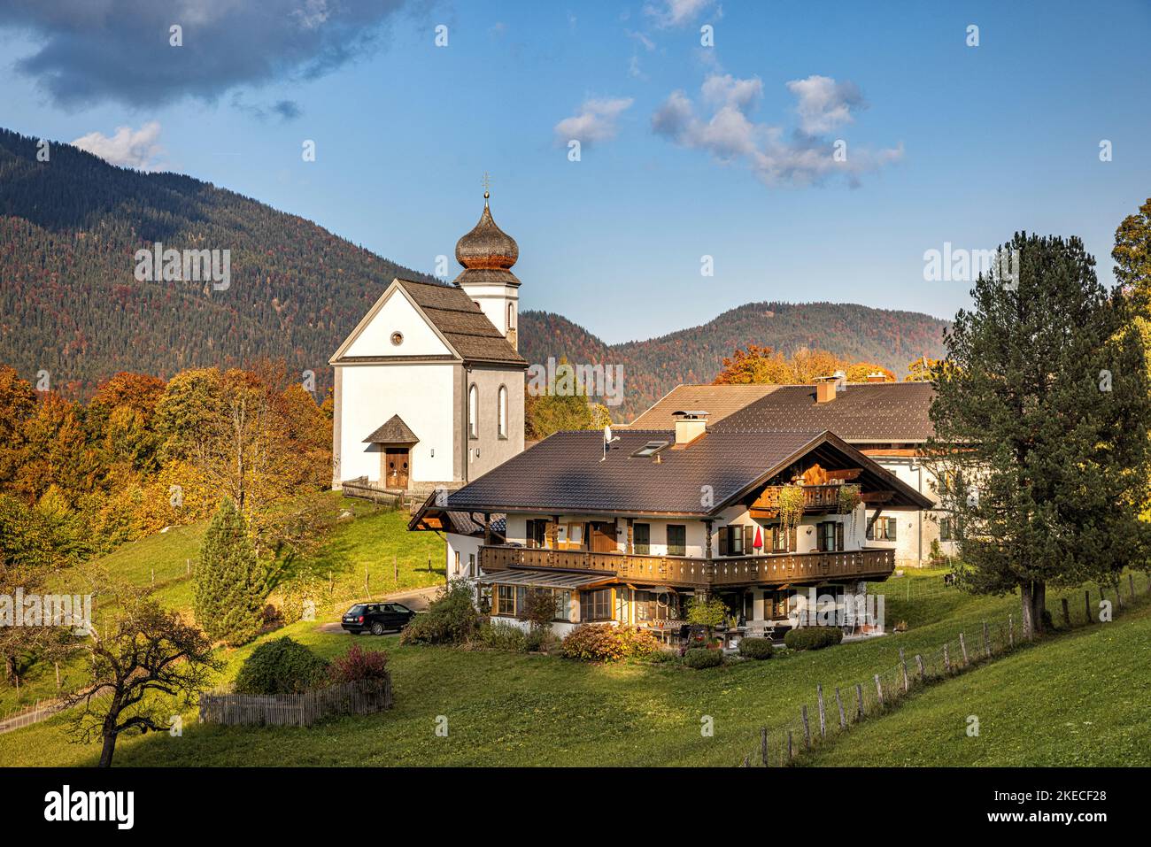 Farmhouse and St. Anna church in Wamberg. Garmisch-Partenkirchen ...
