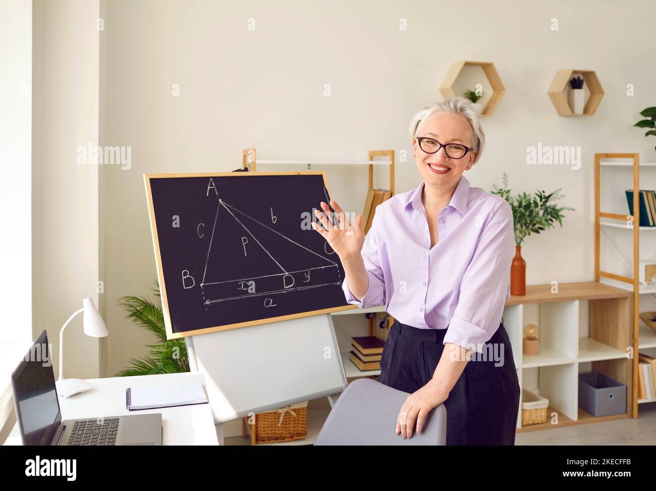 Woman teacher stands video hi-res stock photography and images - Alamy