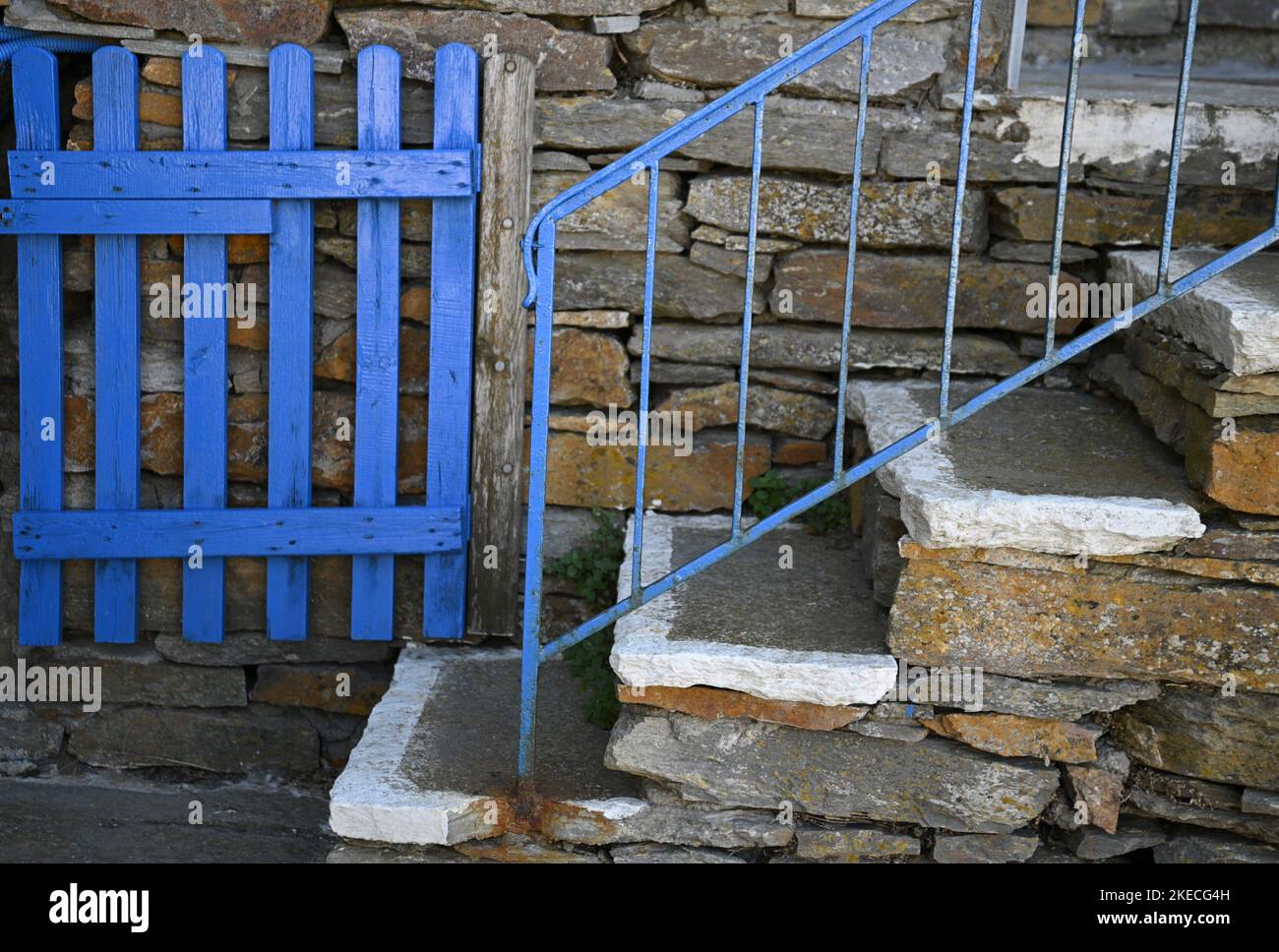 Traditional rural house handcrafted stone wall, stairway with wrought ...