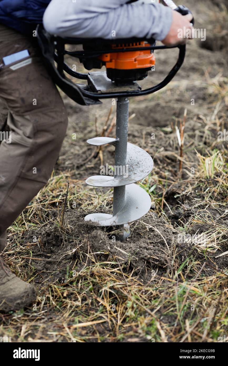 Shallow depth of field (selective focus) details with a man using a ...