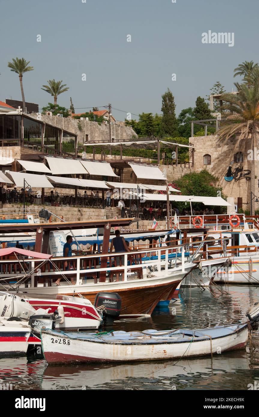 Harbour, Byblos, Lebanon. Pretty harbour with boats, houses and palm ...