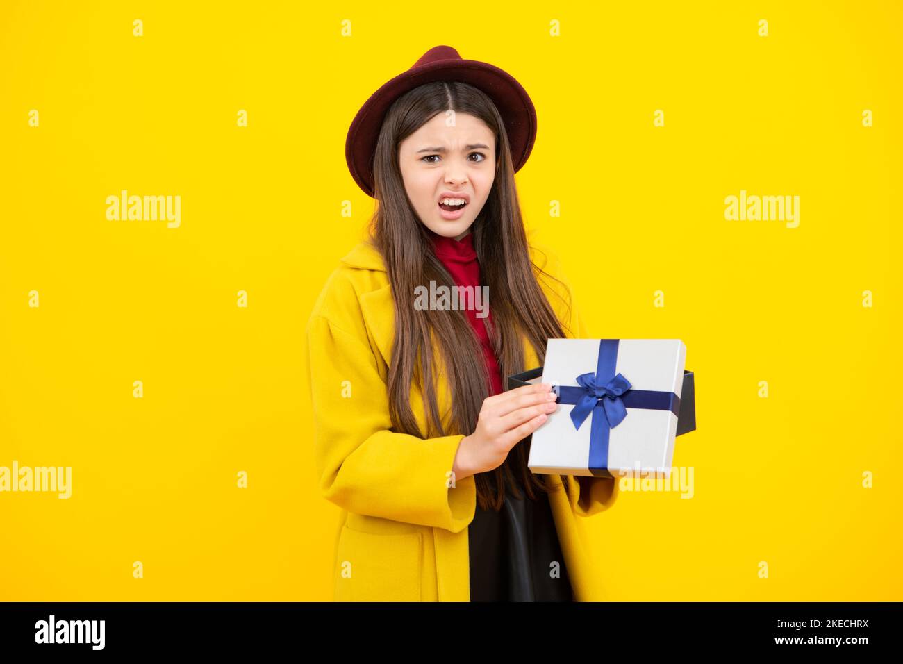 Teenager kid with present box. Teen girl giving birthday gift. Present ...