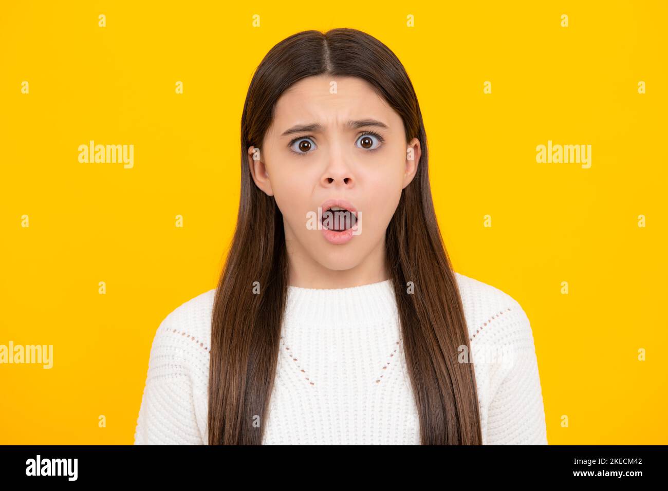 Angry teenager girl, upset and unhappy negative emotion. Close-up ...