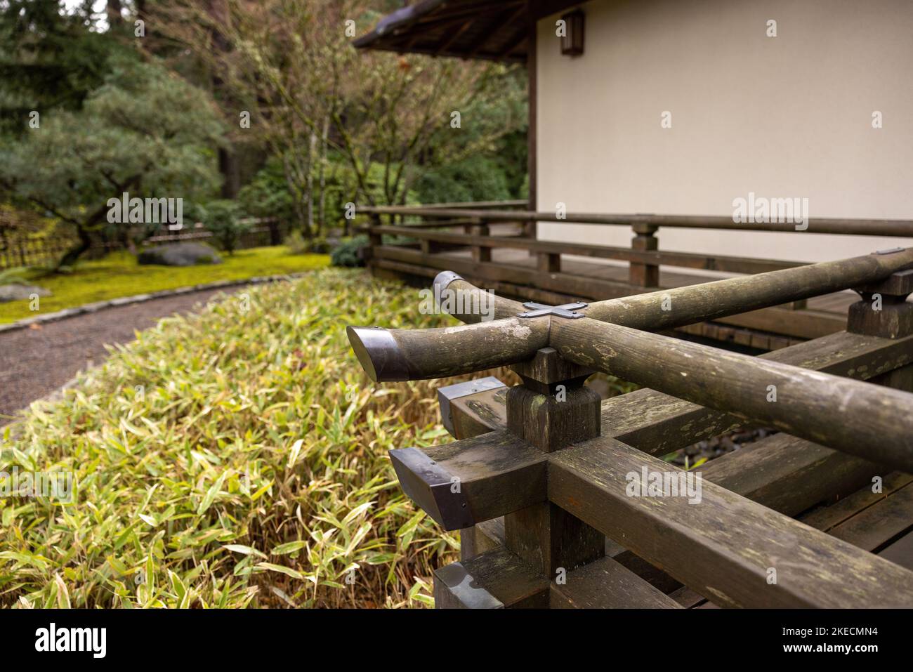 A scenic shot of the exterior of a Japanese style building surrounded ...