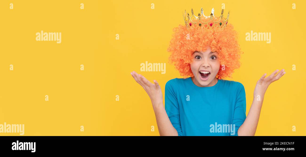 surprised selfish child girl in curly wig and princess diadem, surprise ...