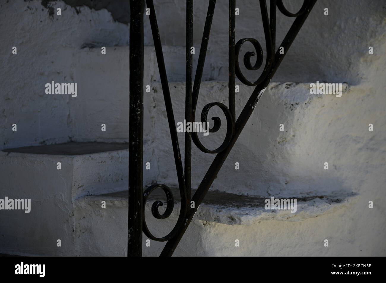 Traditional handcrafted wrought iron stairway railing in Kea island ...