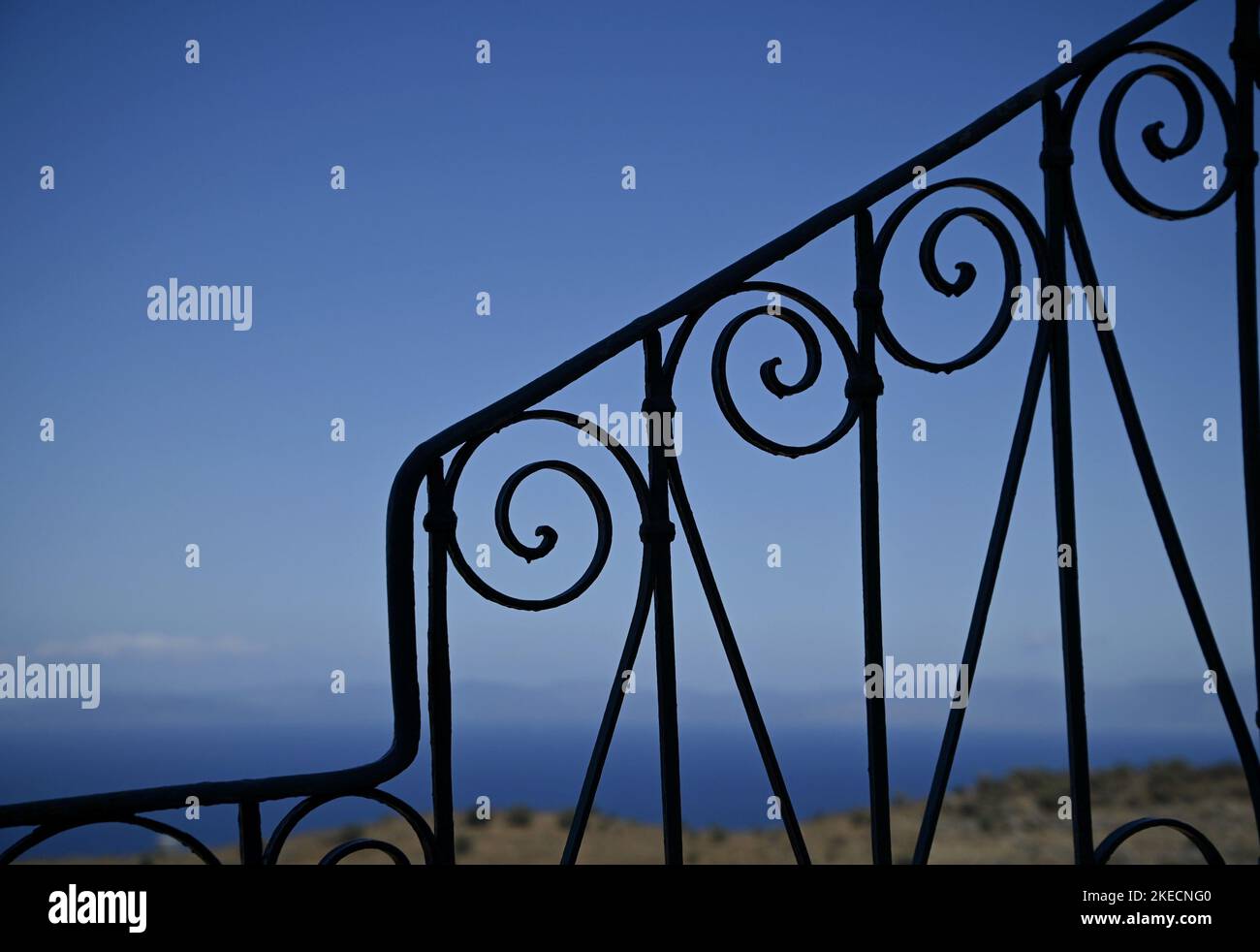 Traditional handcrafted wrought iron stairway railing in Kea island ...