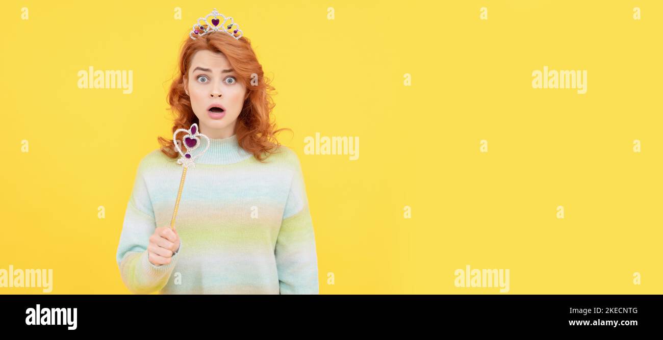 surprised redhead woman in queen crown with magic wand, surprise. Woman ...