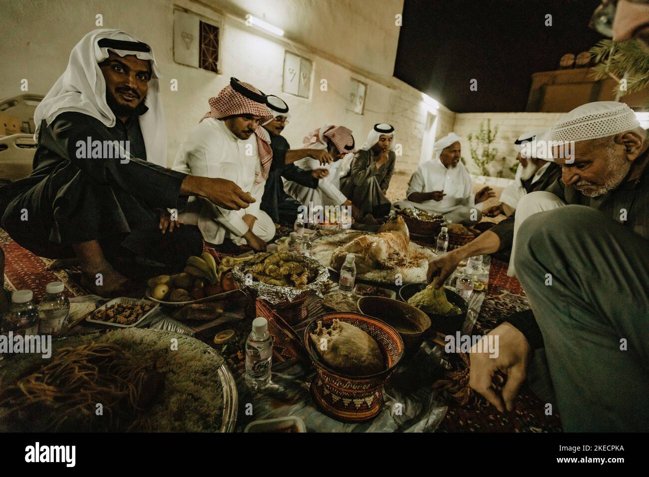 Saudi Arabia, Najran province, Najran, men, dinner Stock Photo - Alamy
