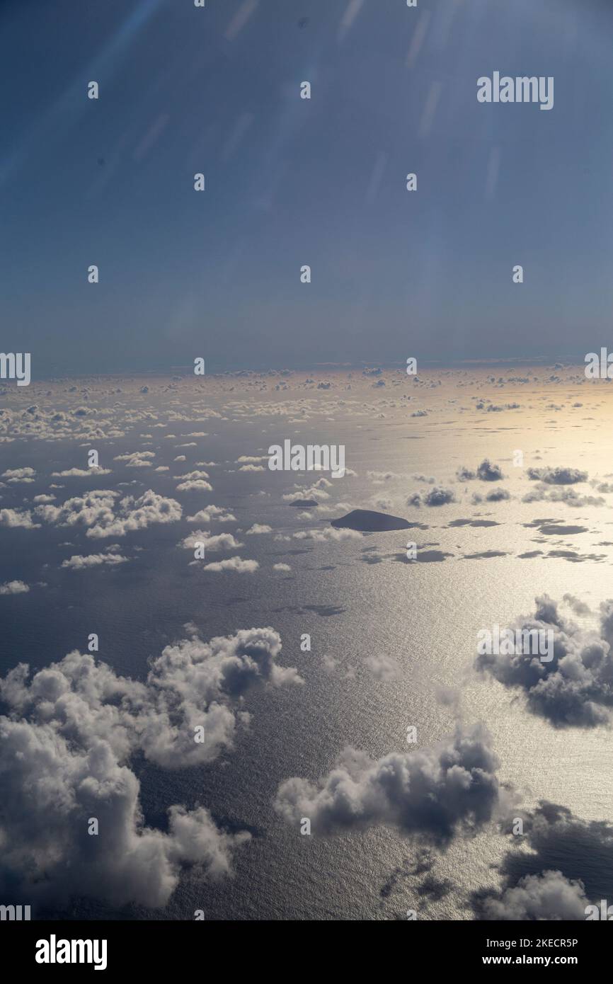 Beautiful scenery through the window of plane. soft fluffy clouds ...
