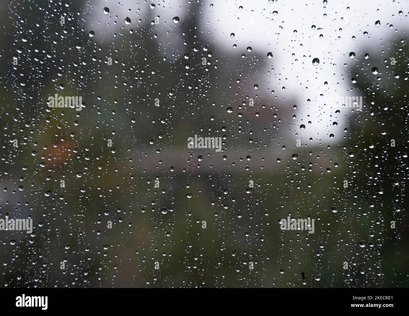 Raindrops falling at the window hi-res stock photography and images - Alamy