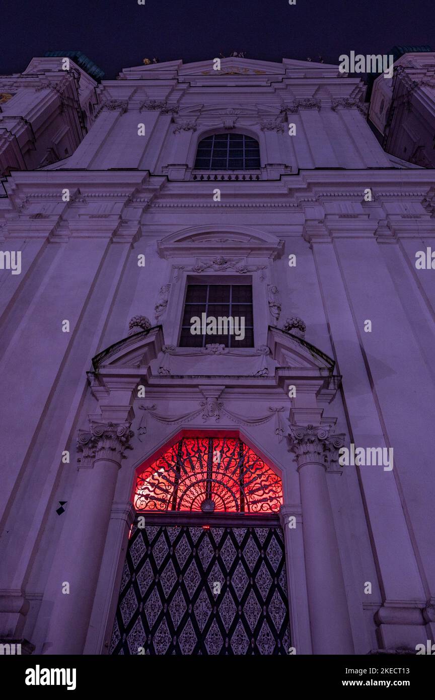 Passau, Germany. 11th Nov, 2022. Red light shines from a window at St ...