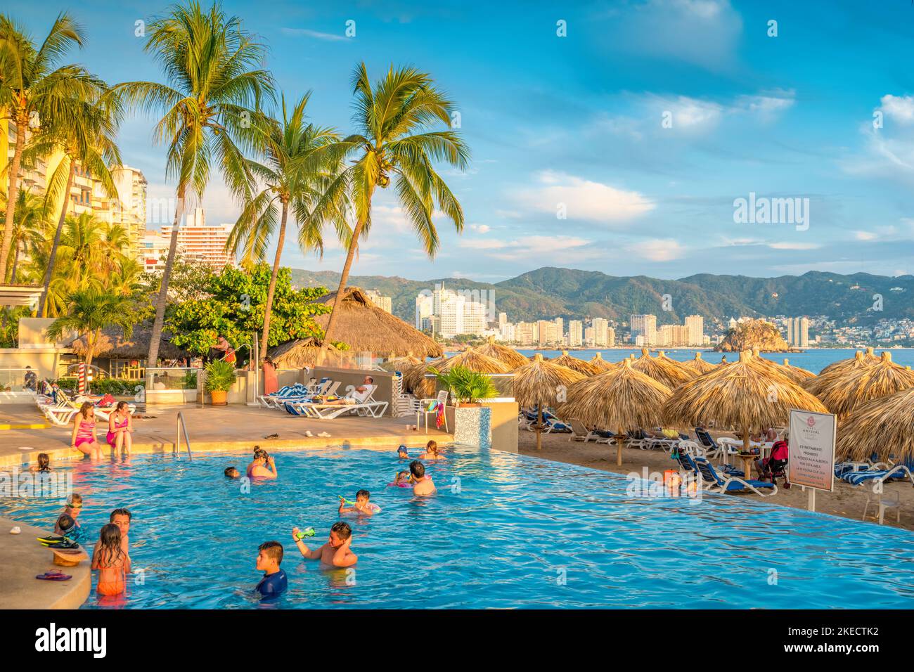People enjoy swimming pool at a hotel, in Acapulco, Guerrero, Mexico ...