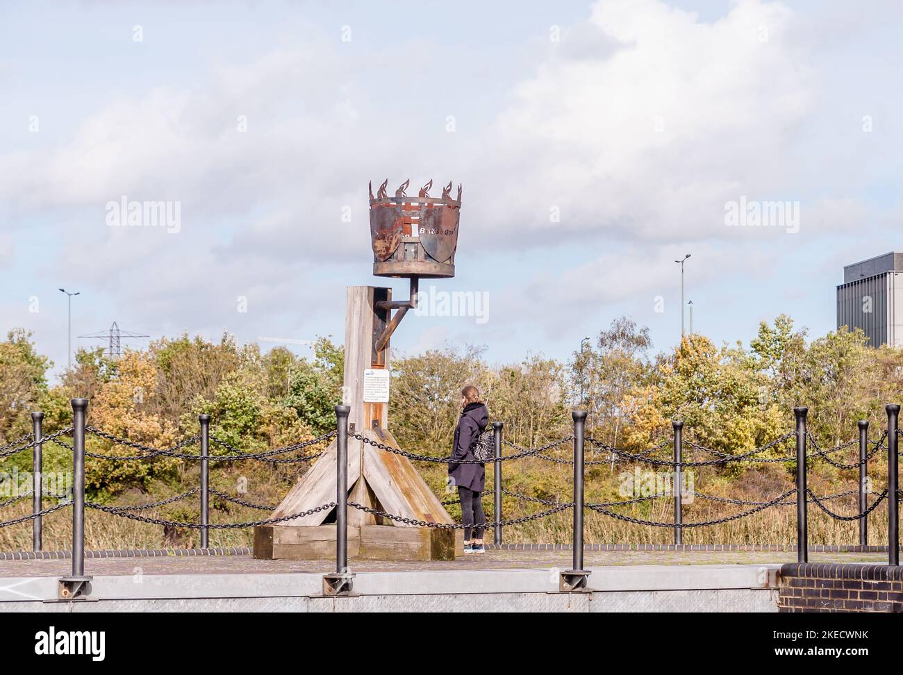 millennium beacon, east India dock basin, blackwall standing next to ...