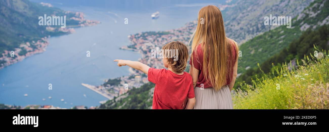 BANNER, LONG FORMAT Mother and son travellers enjoys the view of Kotor ...