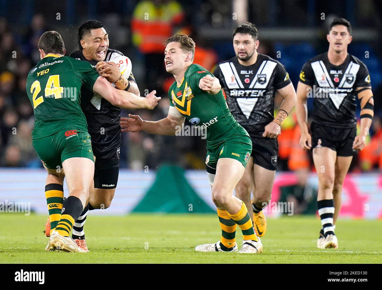 New Zealand's Moses Leota is tackled by Australia's Isaah Yeo (left ...