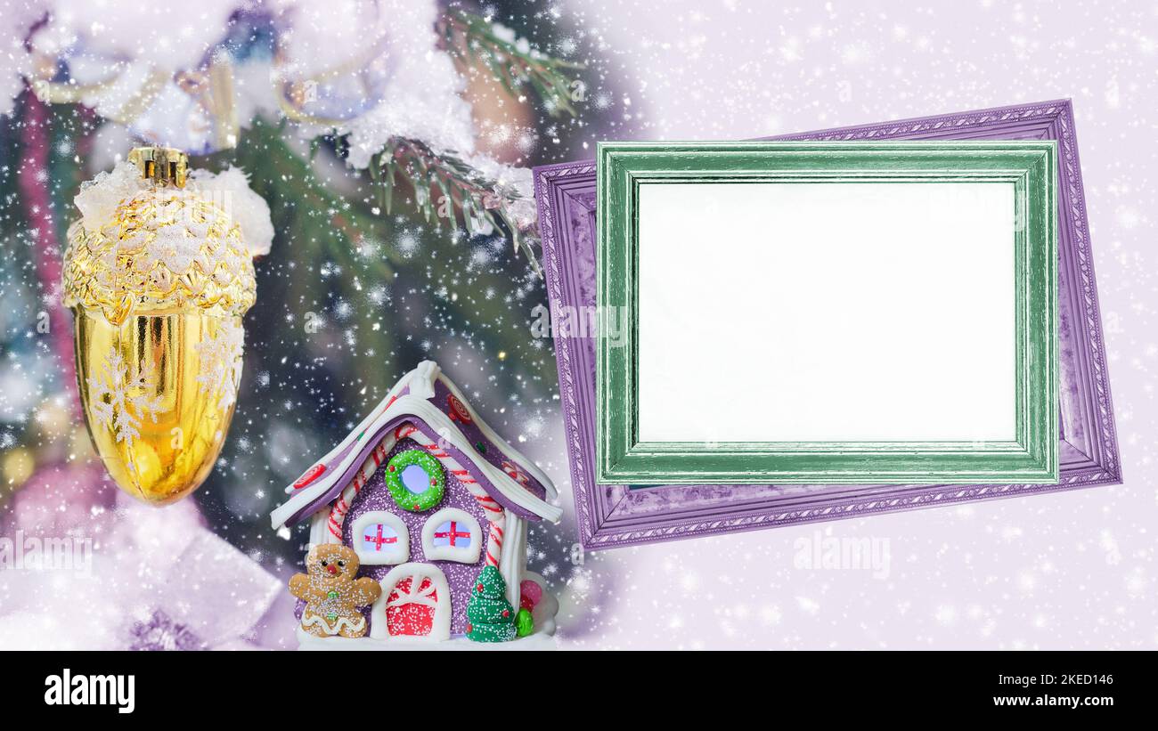 An empty text frame and a lamp in the shape of a gingerbread house on a ...