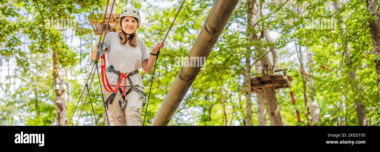 BANNER, LONG FORMAT Happy women girl female gliding climbing in extreme ...