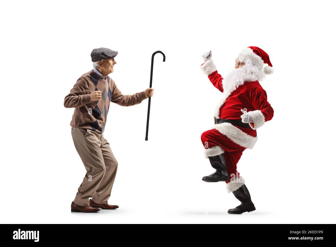 Full length profile shot of an elderly man dancing with santa claus ...