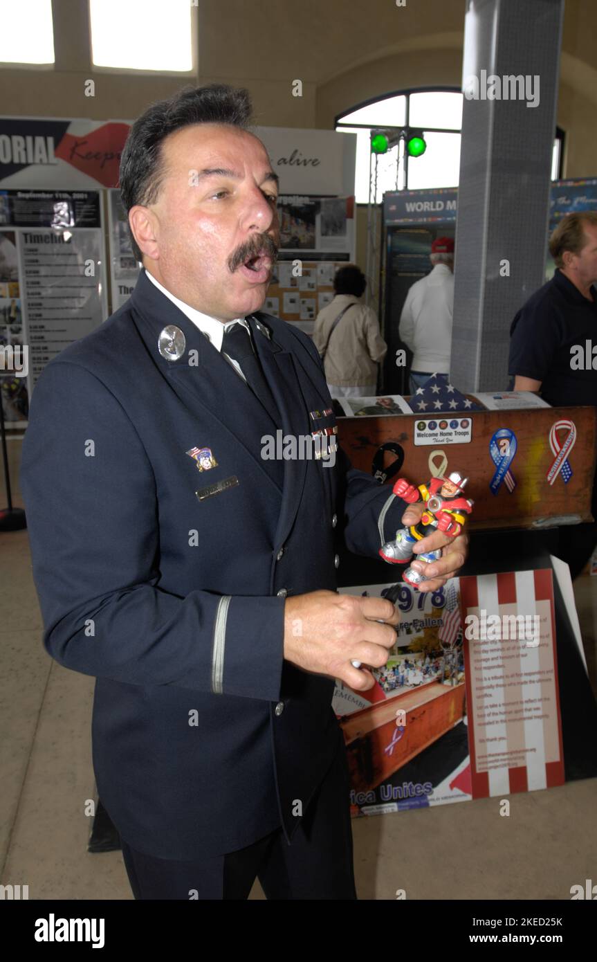 FDNY Lt. Joe Torrillo, (Ret.) speaking to a crowd at a 9/11 remembrance ...