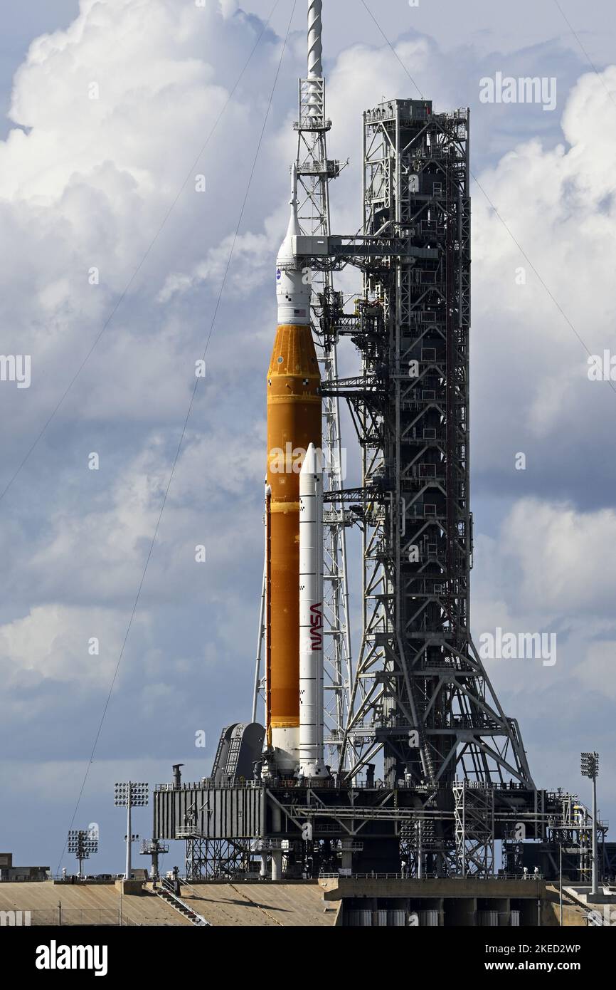 The Space Launch System (SLS) rocket and Orion spacecraft stand on ...
