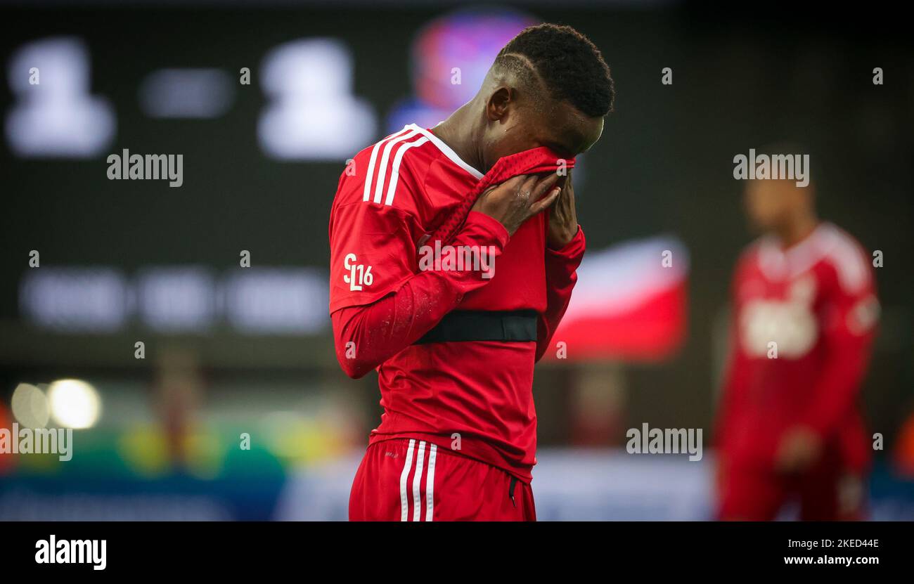 an unidentified player looks dejected after a soccer match between SL16 ...