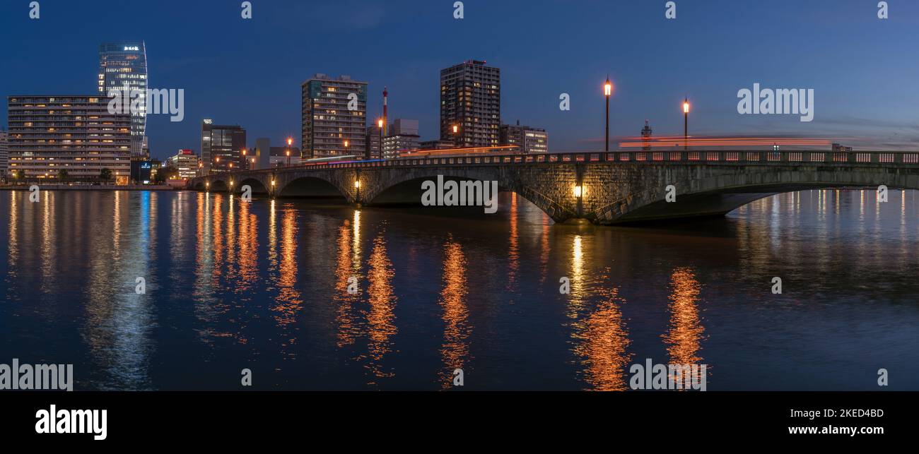 Bandai Bridge over the Shinano River in Niigata, Japan, seen at dusk ...