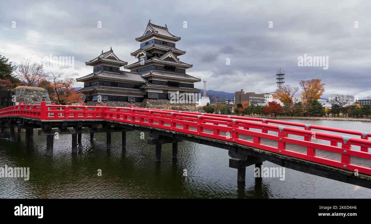 A red bridge leading to Matsumoto Castle, a National Treasure in ...