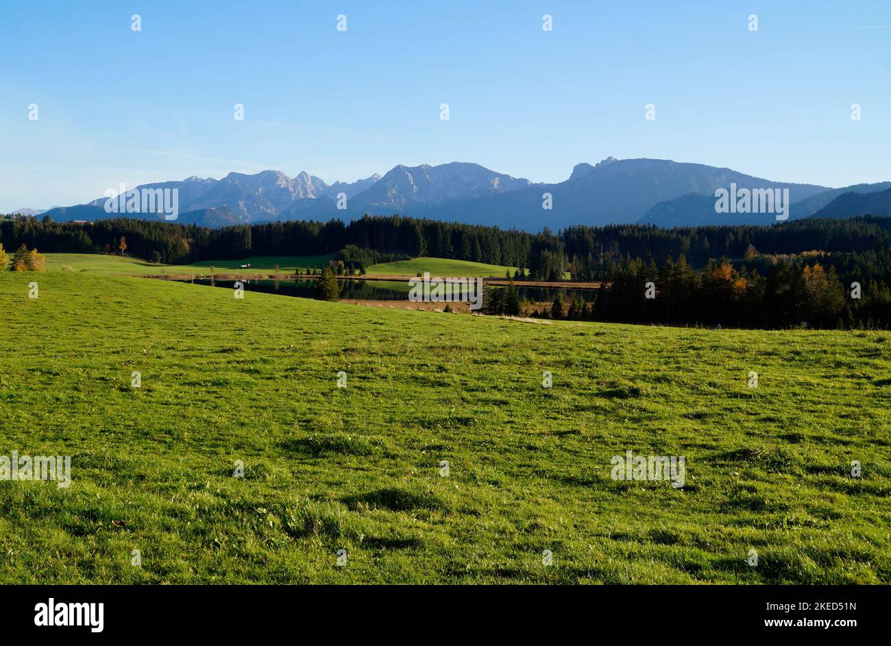 hiking trail overlooking scenic alpine lake Attlesee and the vast, lush ...