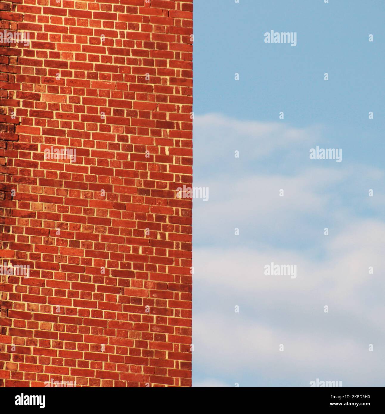 old brick chimney isolated in the sky Stock Photo - Alamy