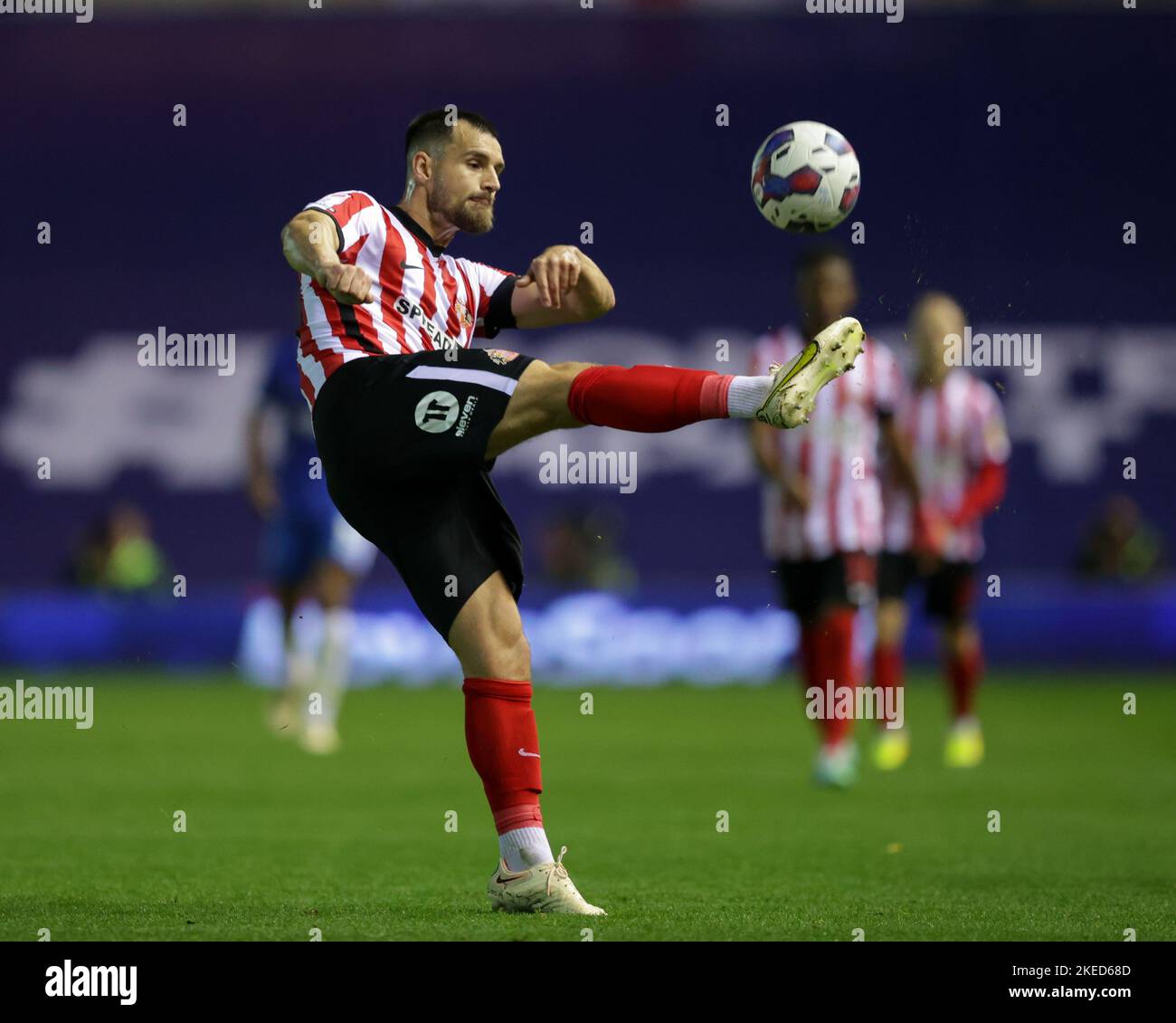 Bailey Wright #26 of Sunderland hooks the ball clear during the Sky Bet ...