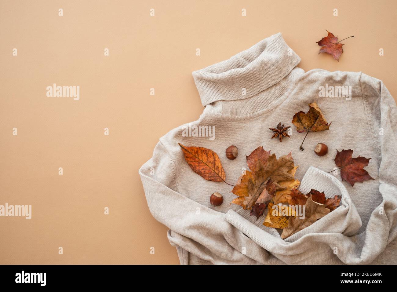 Autumn flat lay background with sweater and fall leaves Stock Photo - Alamy