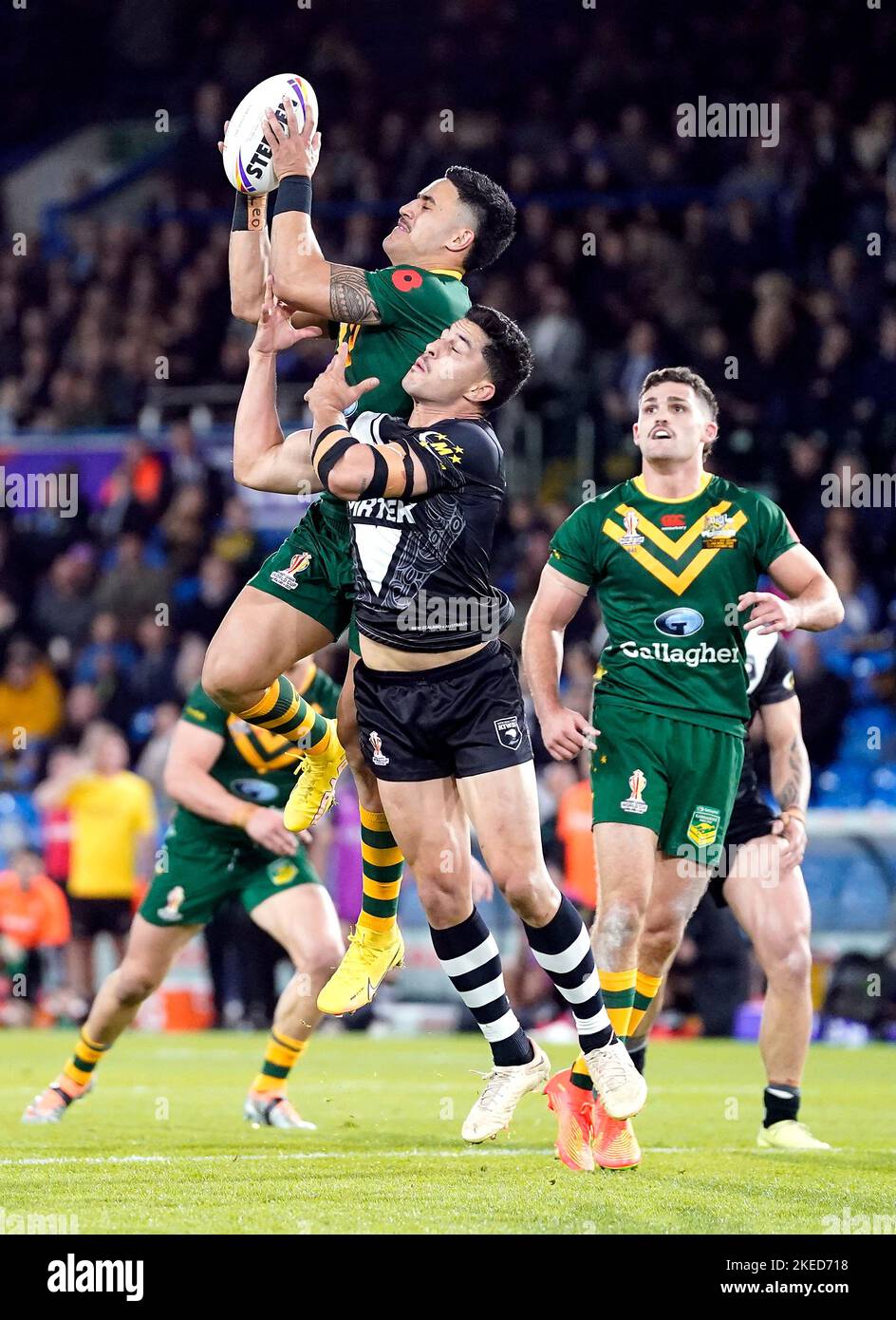 Australia's Valentine Holmes (left) and New Zealand's Moses Leota ...