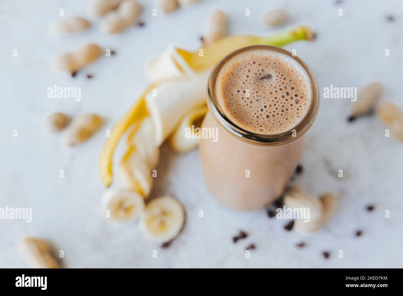 The banana milkshake with butter and peanuts Stock Photo - Alamy