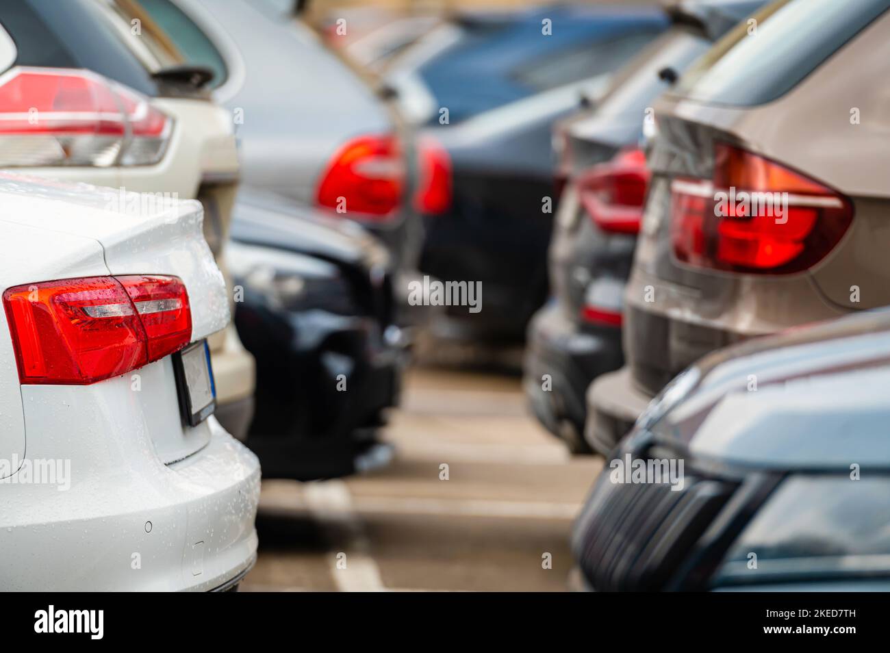 Tight City Parking Full of Cars. Lot of cars are parked in the parking ...