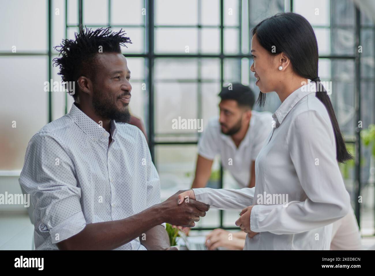 Business Handshake - business people shaking hands. Handshake between ... Business Handshake - business people shaking hands. Handshake between ...